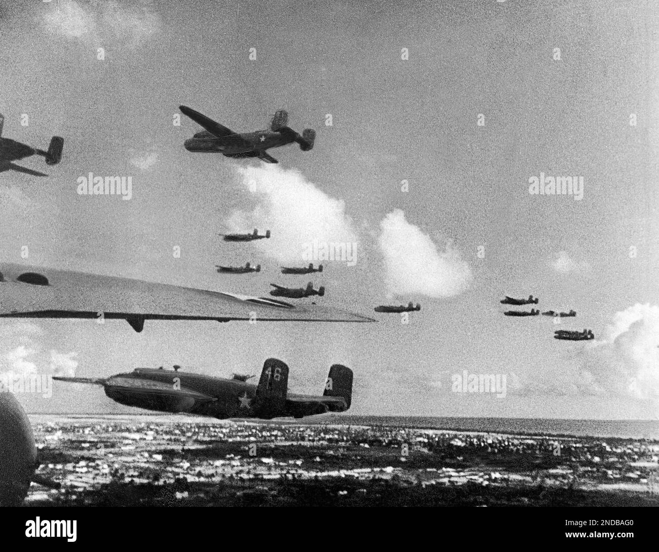 Planes bearing the insignia of the U.S. Army Air Forces roar over ...