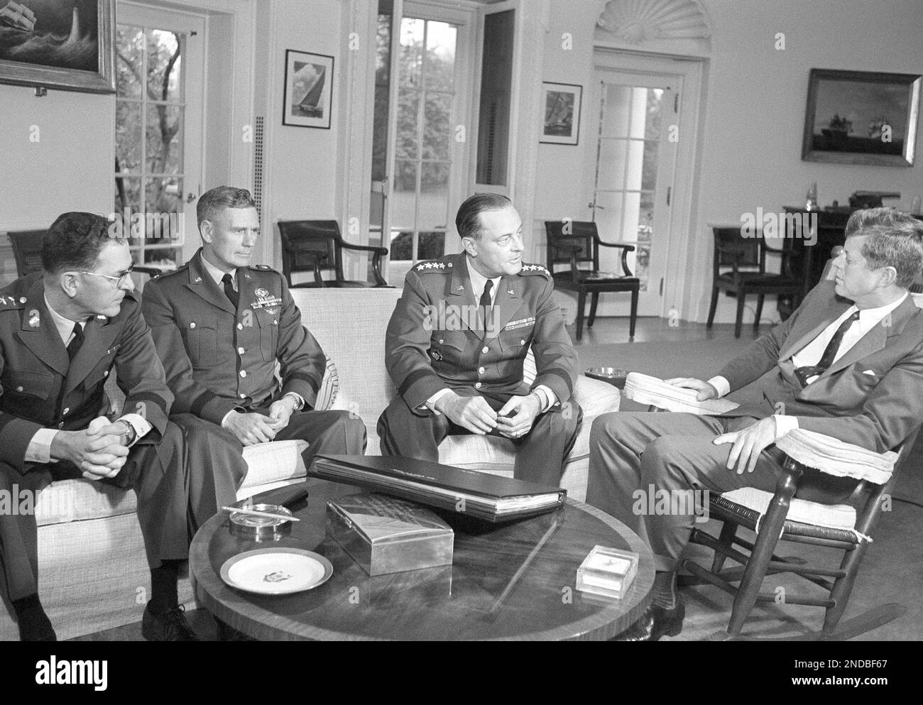 President John Kennedy meets with three Army generals in his White ...