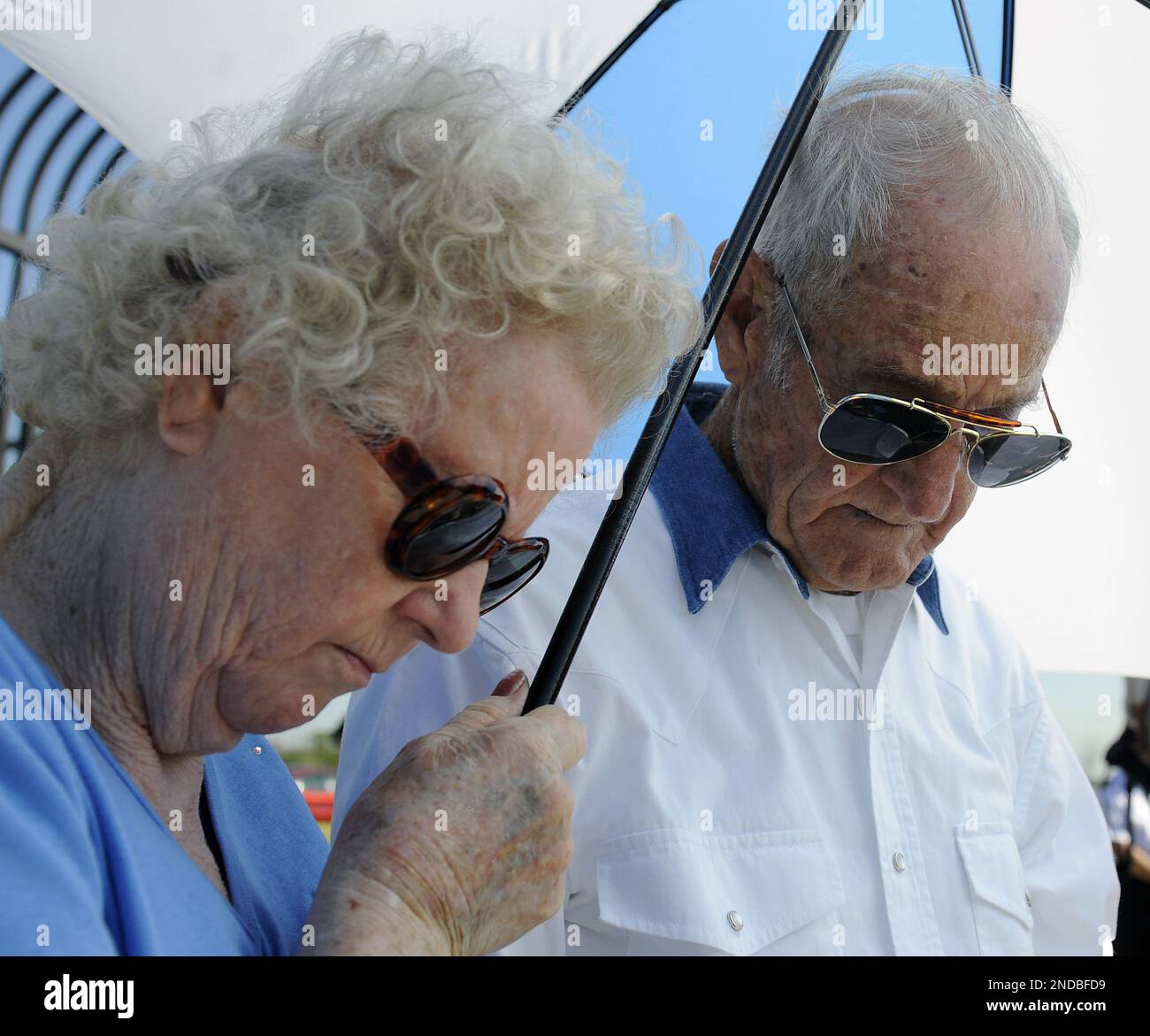 Ruby Christy, left, sits with her husband Bob Christy, right, during ...