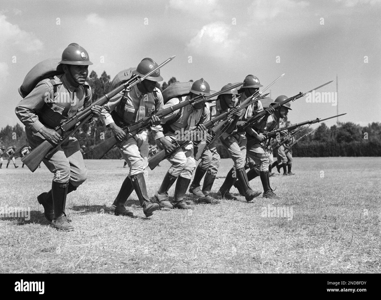 Soldiers of the 47th Mexican Army Battalion demonstrate how a charge ...