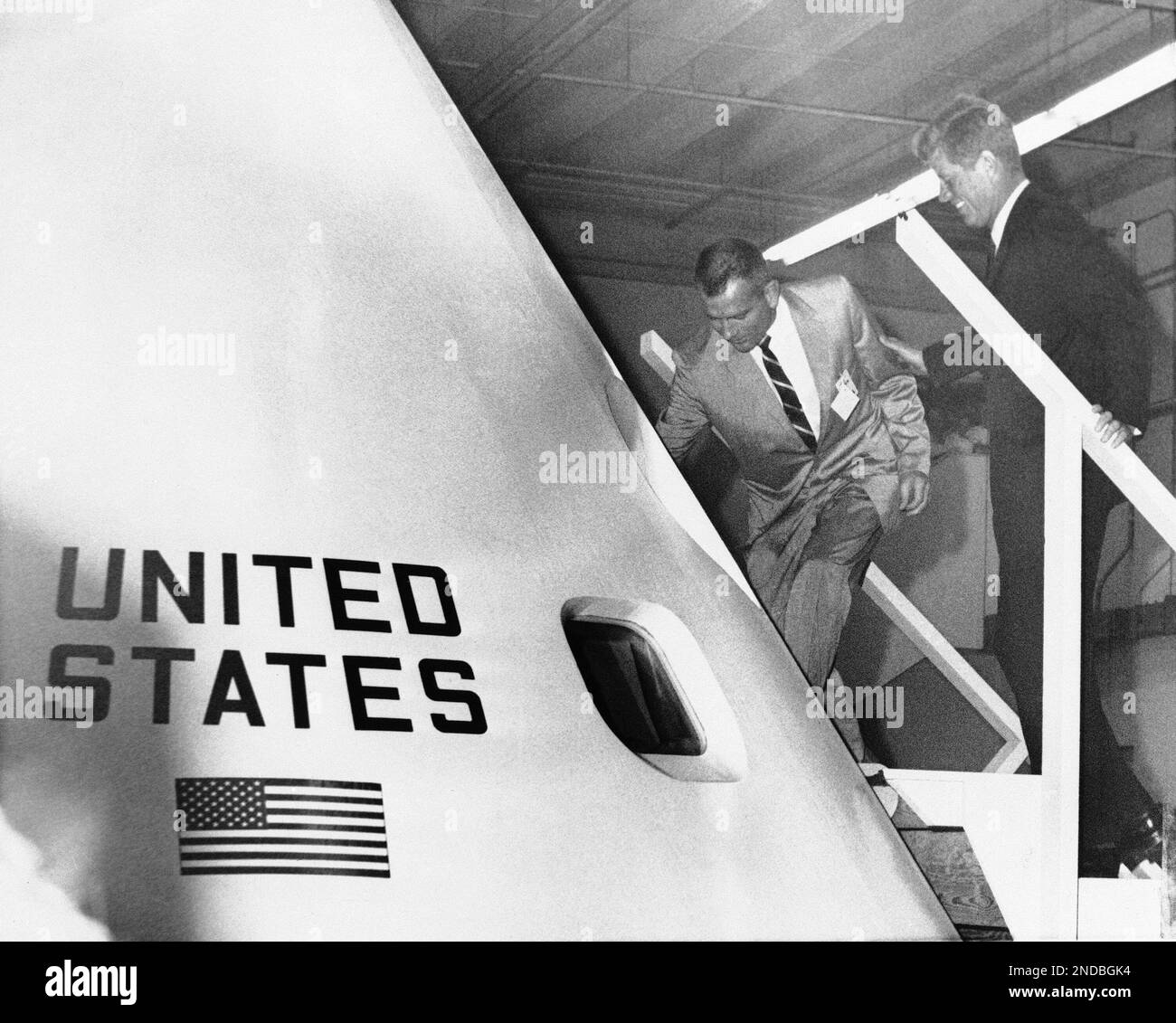 Astronaut Donald K. Slaton escorts President John F. Kennedy into a ...