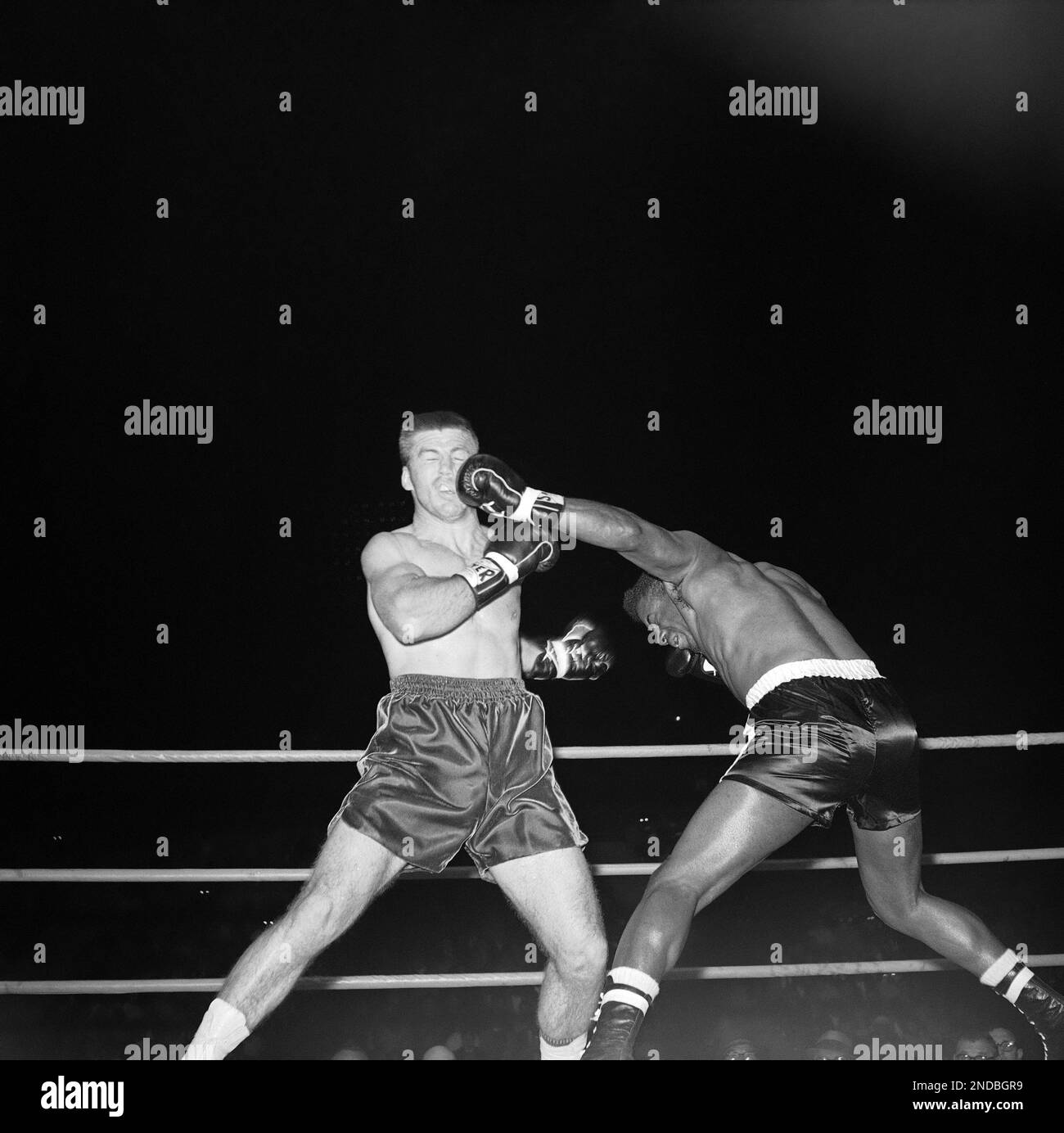 Former heavy weight champion Floyd Patterson lands a long left to the ...