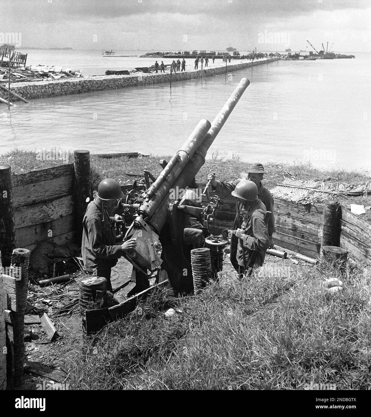 On Makin after the occupation by American forces. Soldiers looking over ...