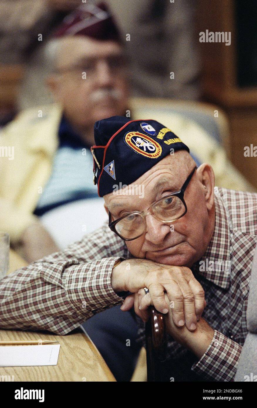 Thomas Gage of Tulsa, Oklahoma leans on his cane as he watches ...