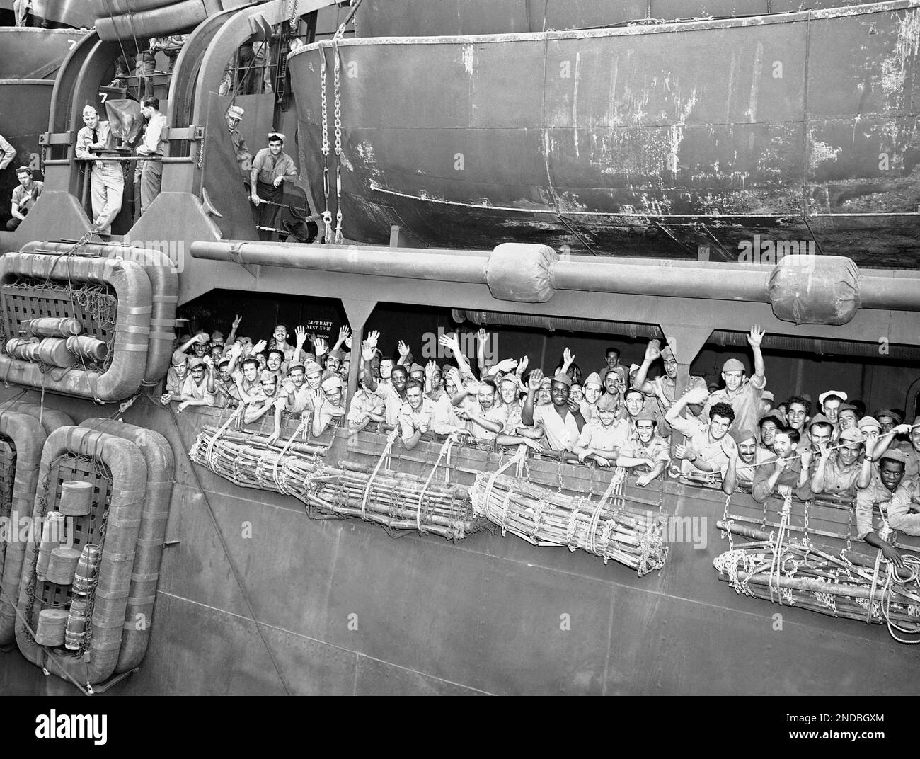 Soldiers of the Brazilian expeditionary force line the rail of the ...