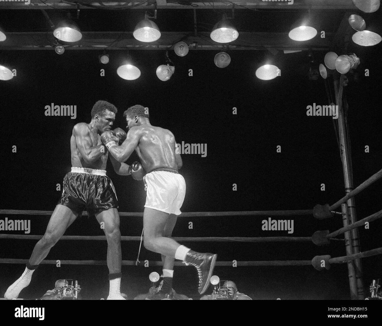 Floyd Patterson gets in a left to chin of Hurricane Jackson as latter’s ...