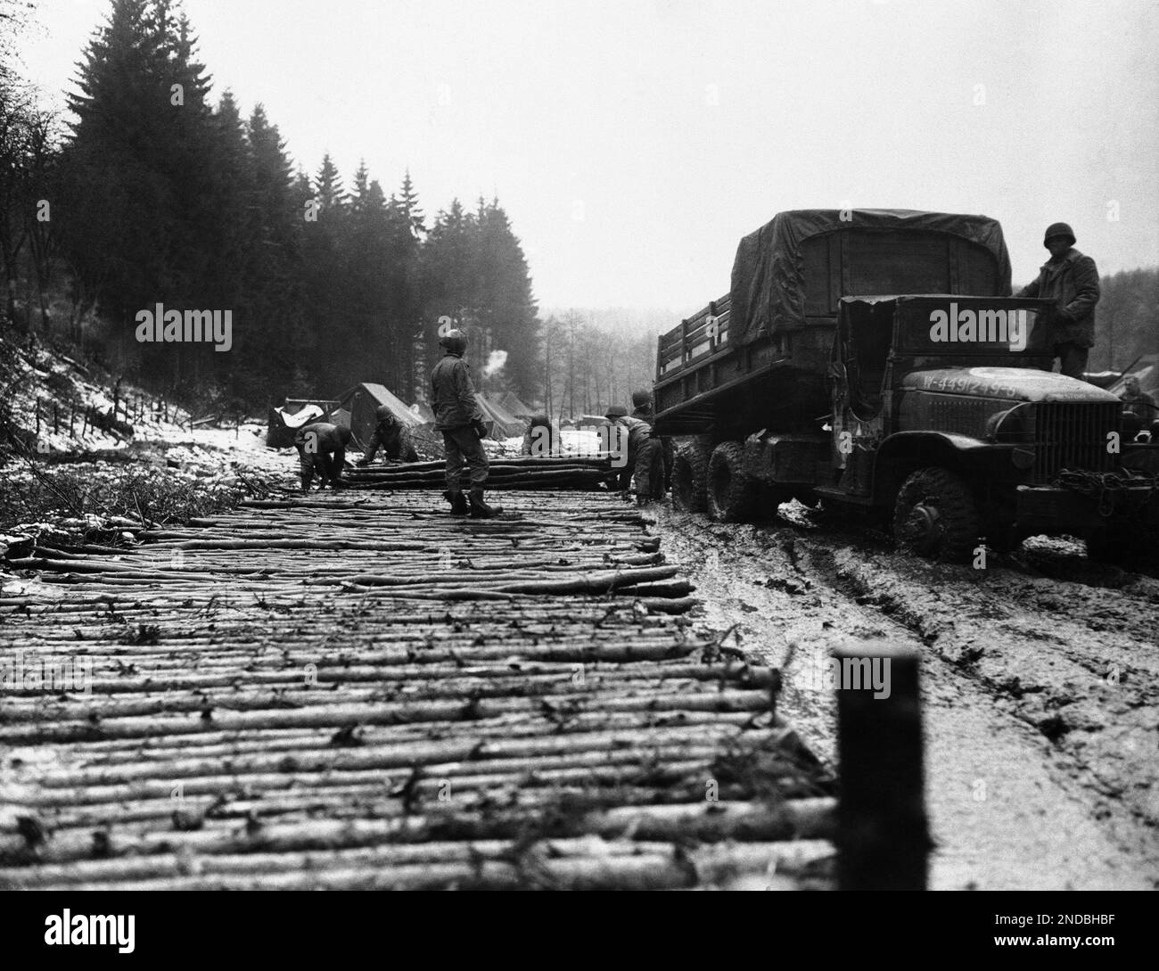 Engineers of a U.S. infantry division constructed a corduroy road ...