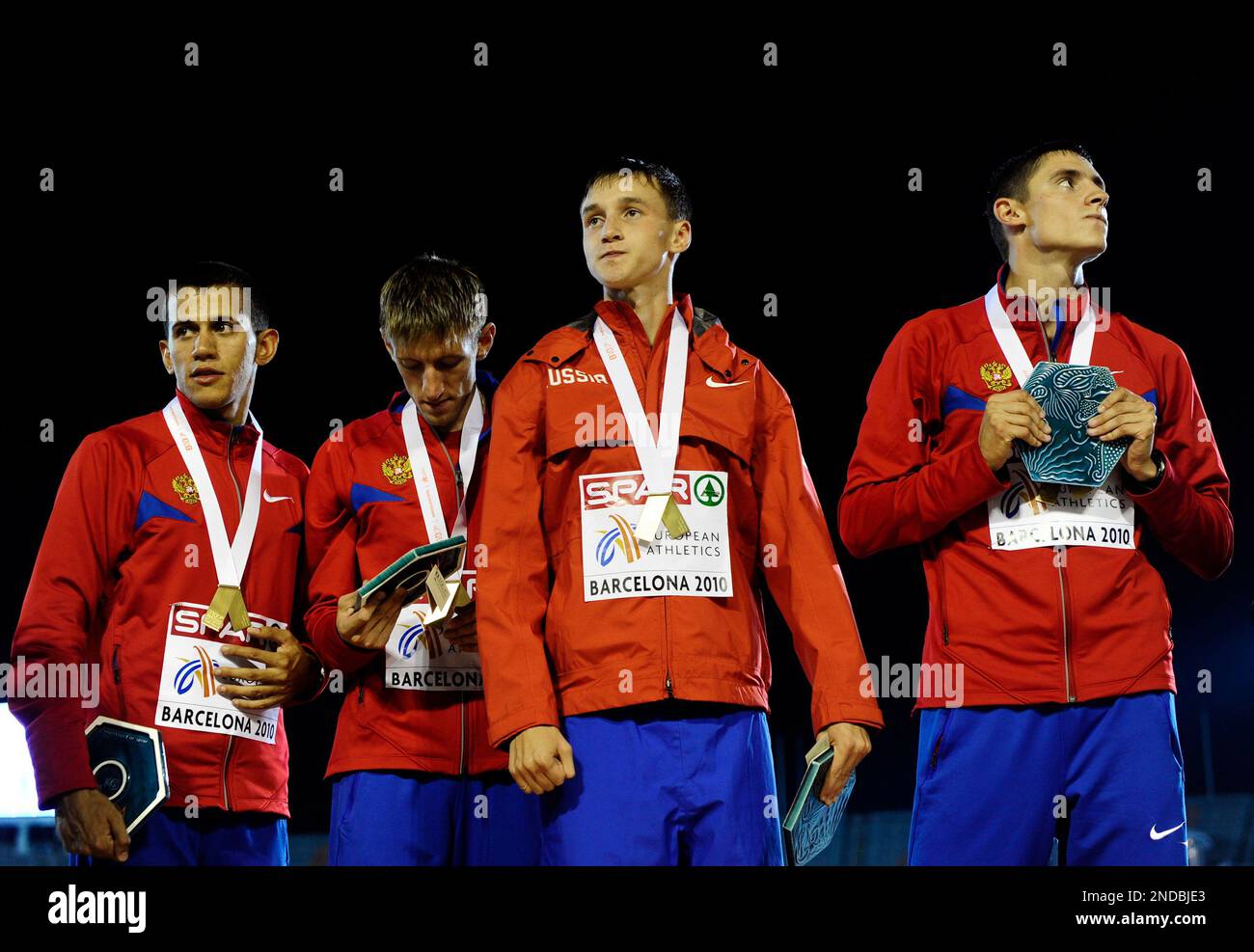 Russia team pose with their gold medals of the Men's 4x400m Relay ...