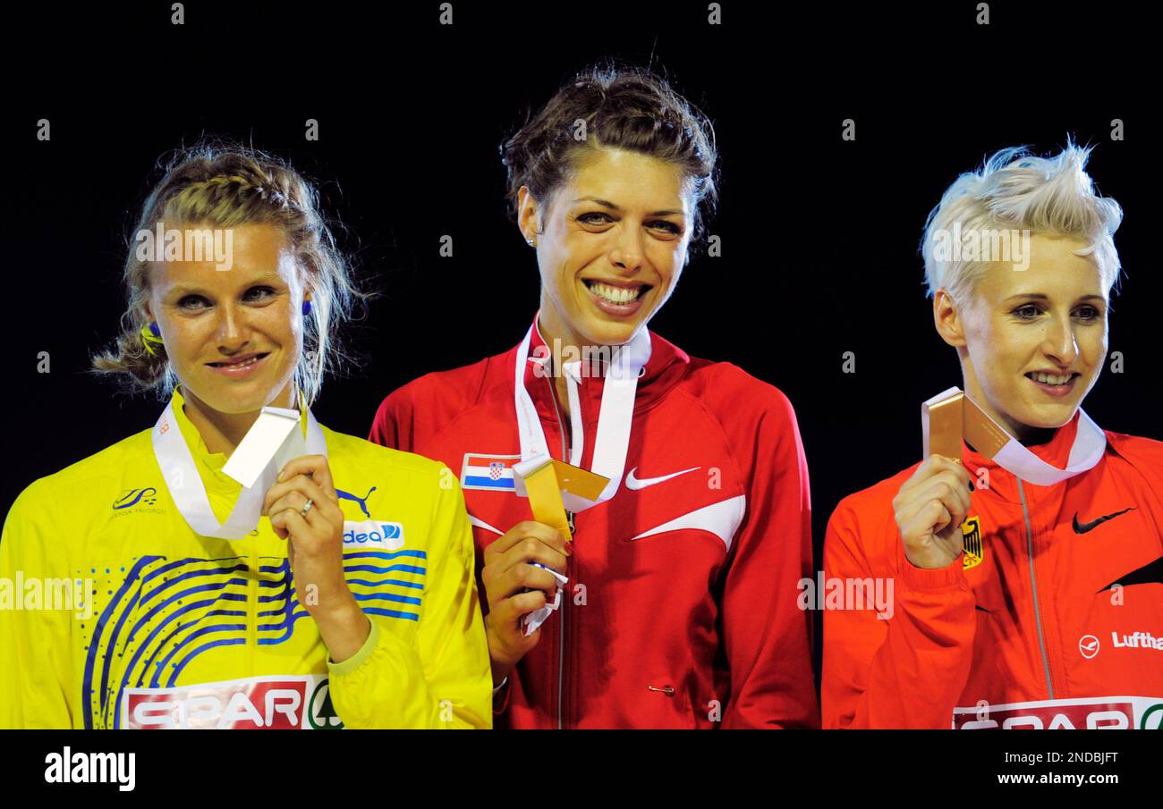 Croatia's Blanka Vlasic, center, Sweden's Emma Green, left, and Germany ...
