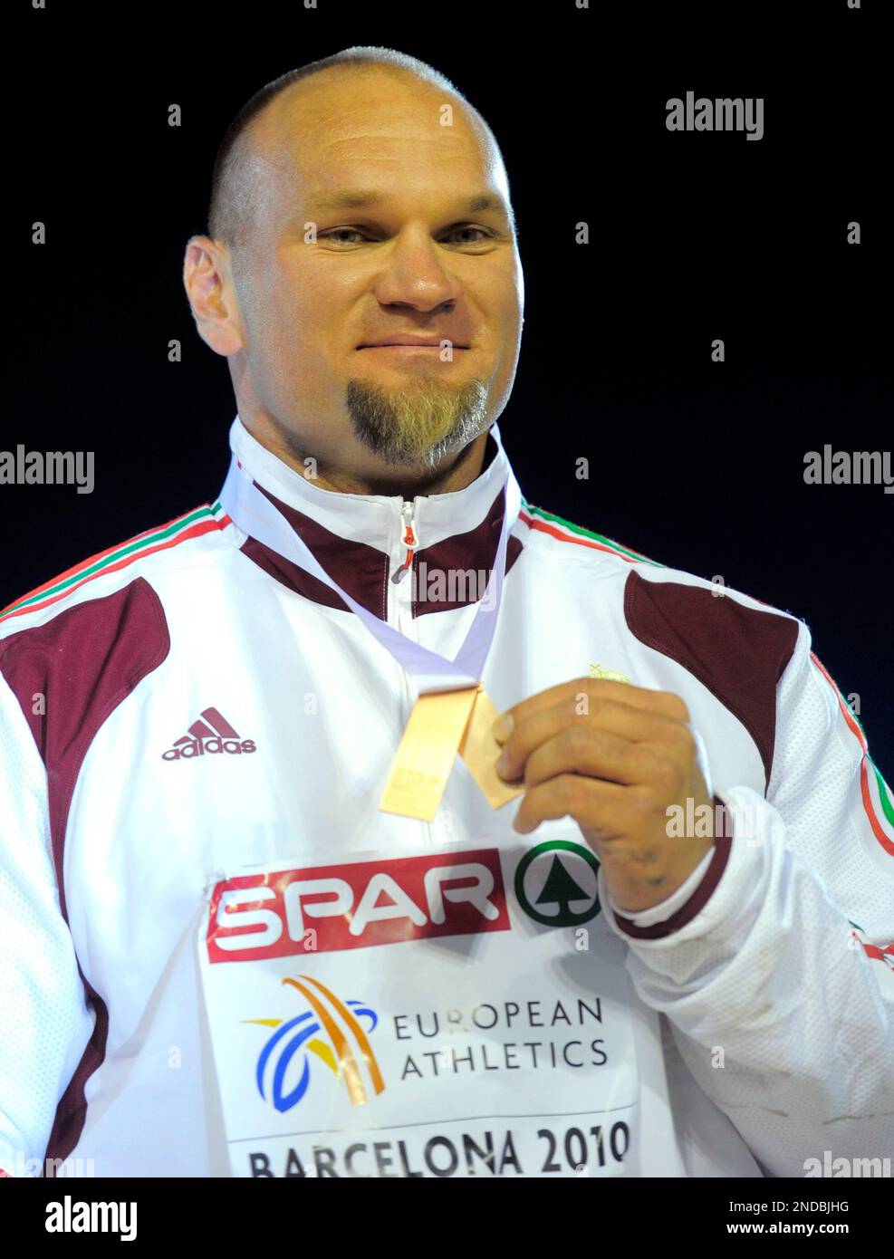 Hungary's Robert Fazekas poses with his bronze medal during the medals ...