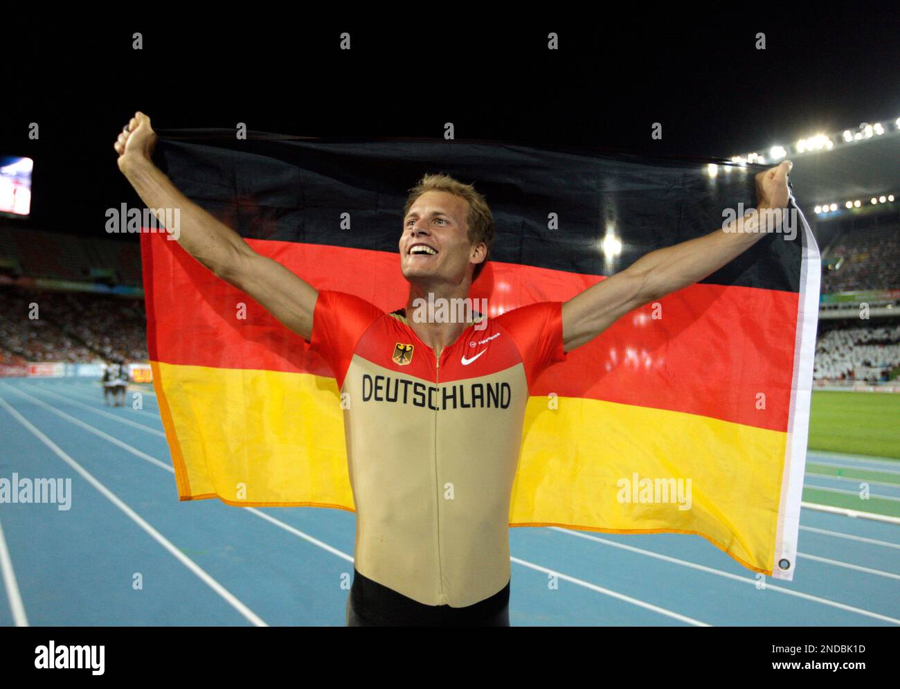 Germany's Christian Reif celebrates after winning the gold medal in the ...