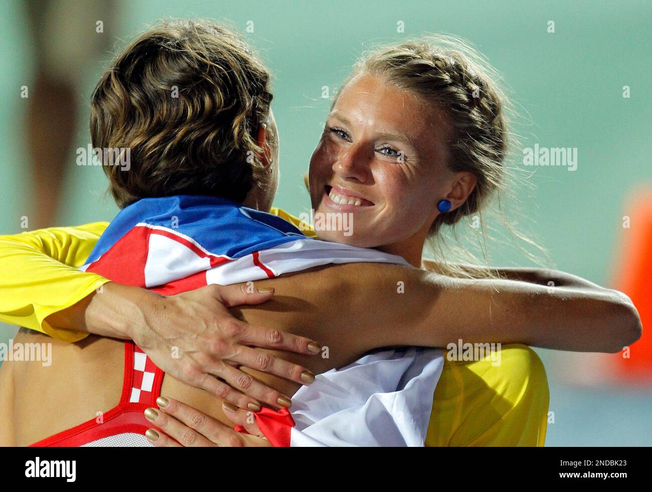 Silver medal's winner Sweden's Emma Green, right, hugs gold medal's ...
