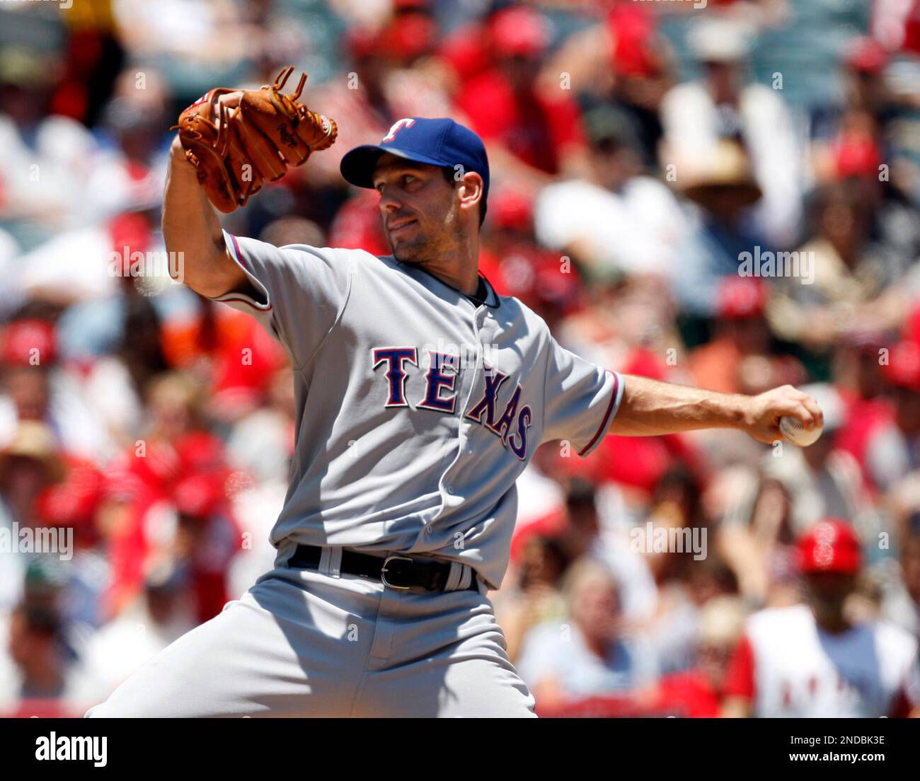 Texas Rangers starting pitcher Cliff Lee delivers a pitch against the ...
