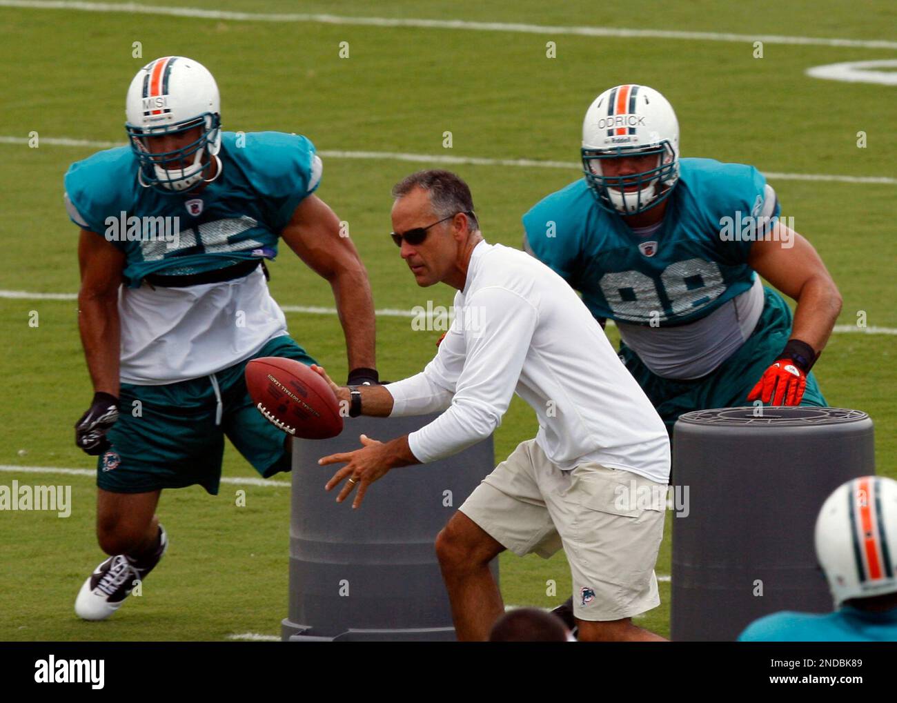 Miami Dolphins defensive coordinator Mike Nolan runs players through ...