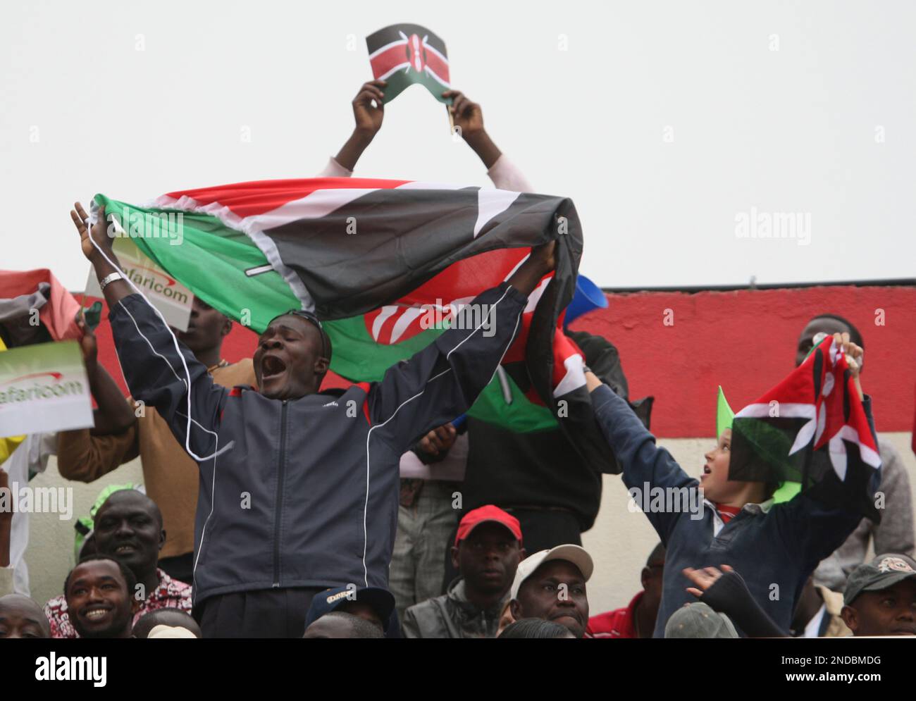 Kenyans cheer the Kenyan team in the 5000 meters men final, during the ...
