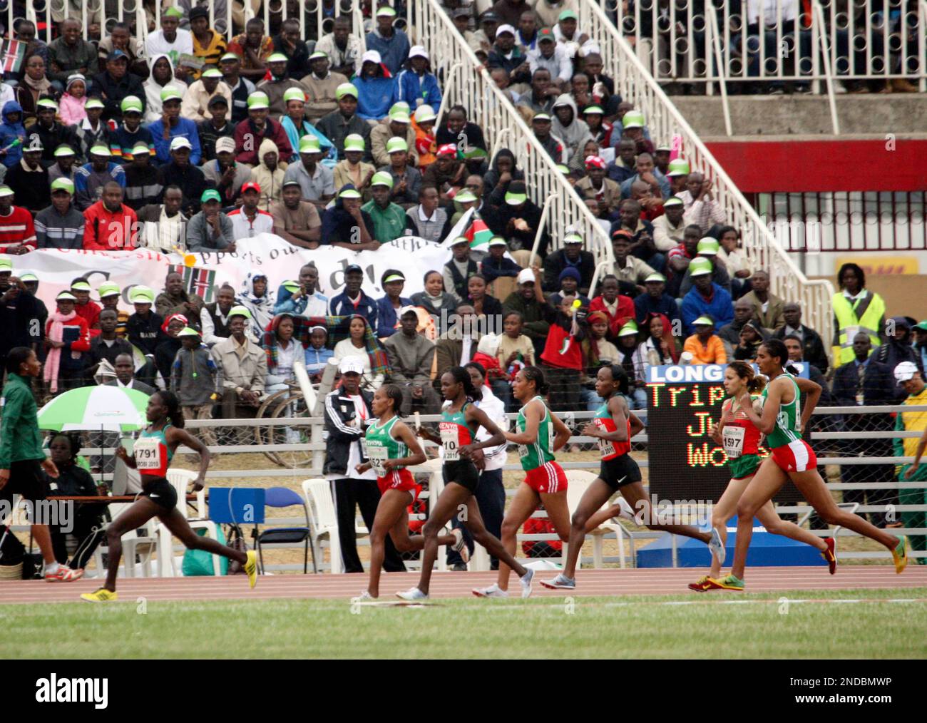 Milcah Chemos of Kenya sprints for the finish line to take gold medal ...