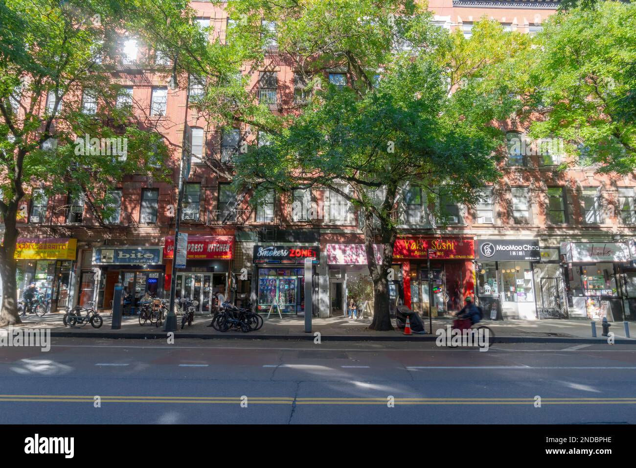 Many stores open along 14th Street in East Village NYC Stock Photo - Alamy