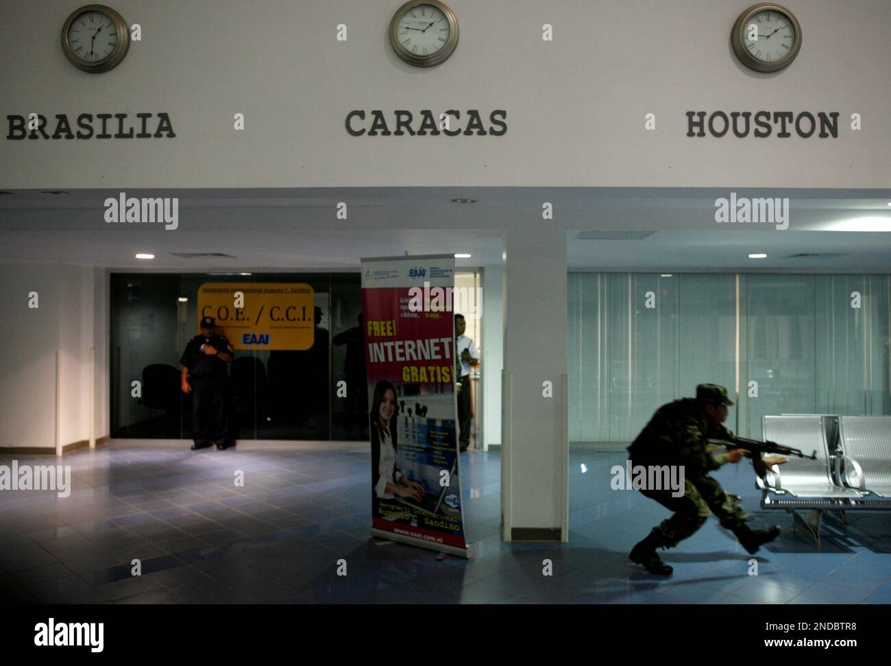 A soldier takes part in an attack security drill at the Augusto C ...