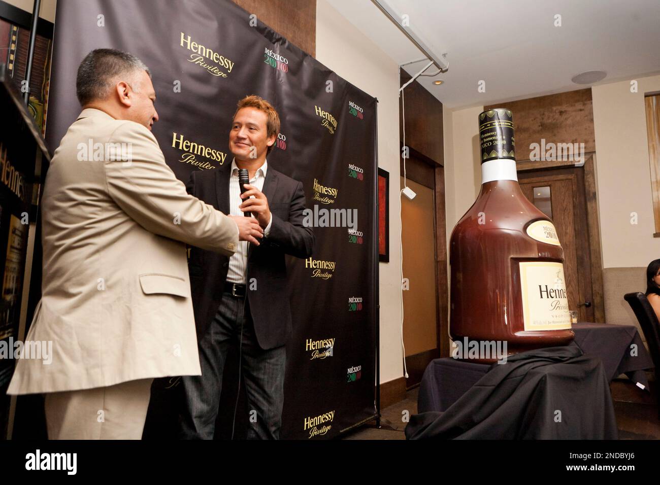Hennessy Hispanic Marketing Director Manny Gonzales, left, and Mexican ...