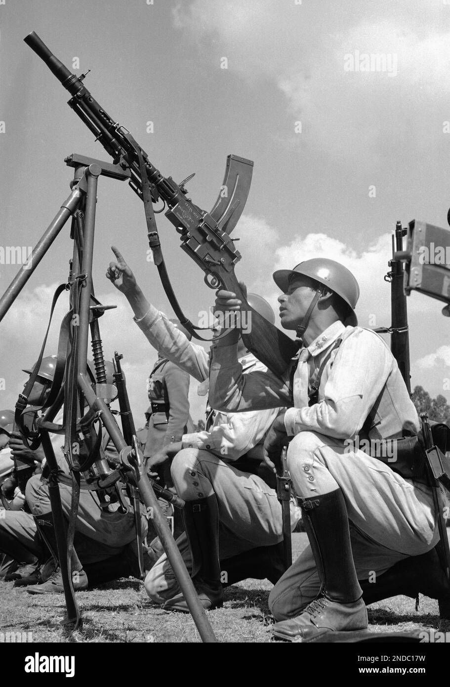 Mexico army 47th battalion machinegunners sighting guns at anti aircraft positions Nov. 25, 1940 ...