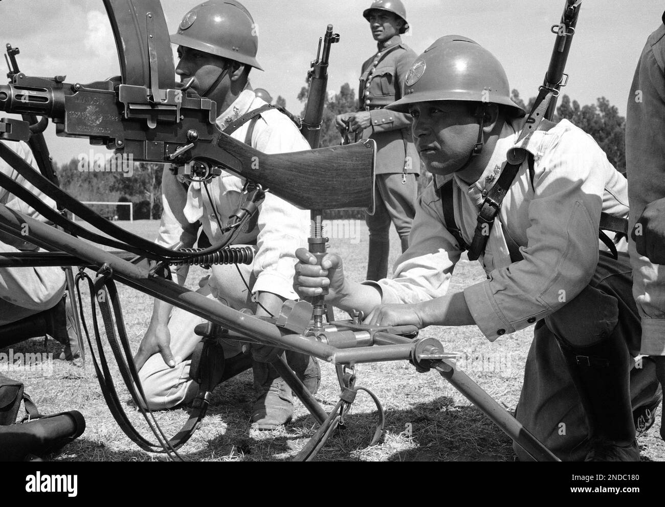 Mexico army machine gunner sights his Madsen gun Nov. 25, 1940. (AP ...