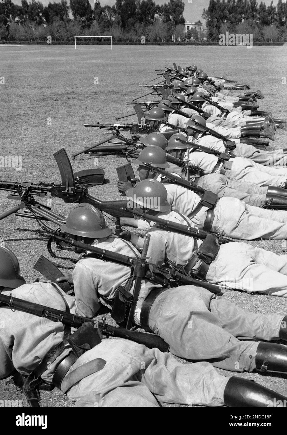 Mexico army 47th battalion line of machine gunners in prone firing ...