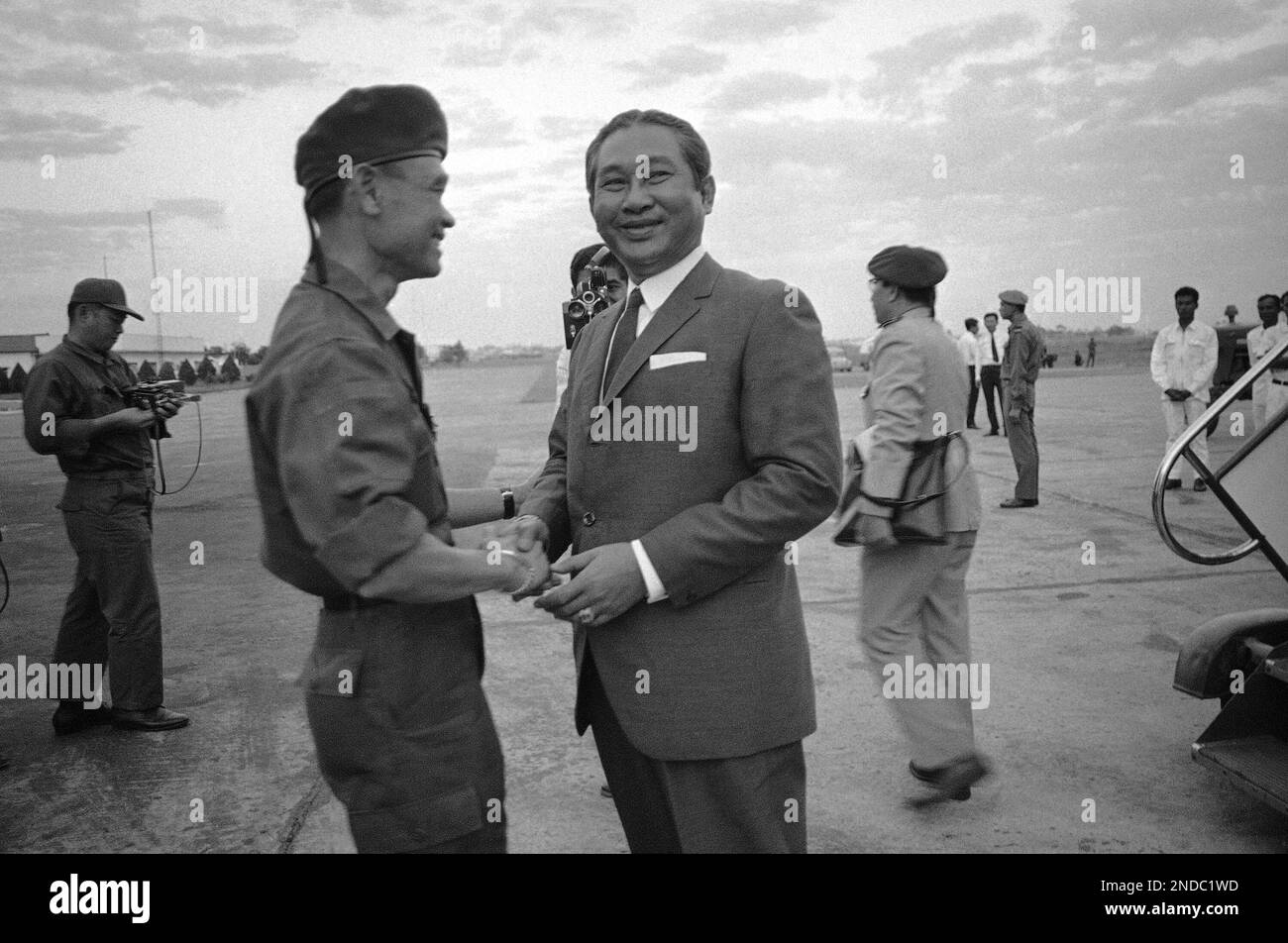 Lon Nol coming from South Vietnam, greeted by Sirik Matak and Cambodian ...