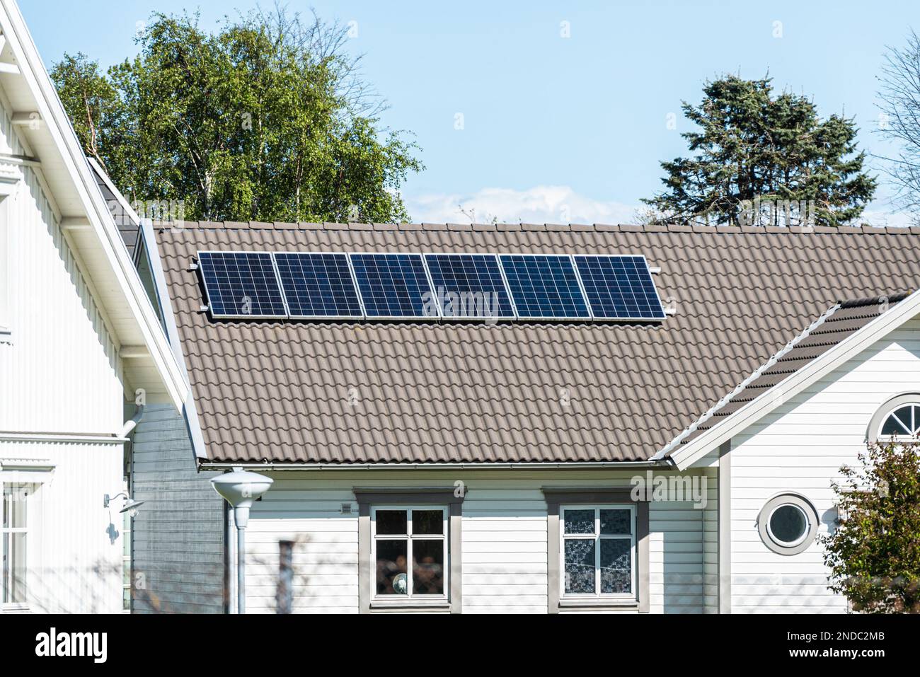 Solar cell panels mounted on the roof of a house Stock Photo - Alamy