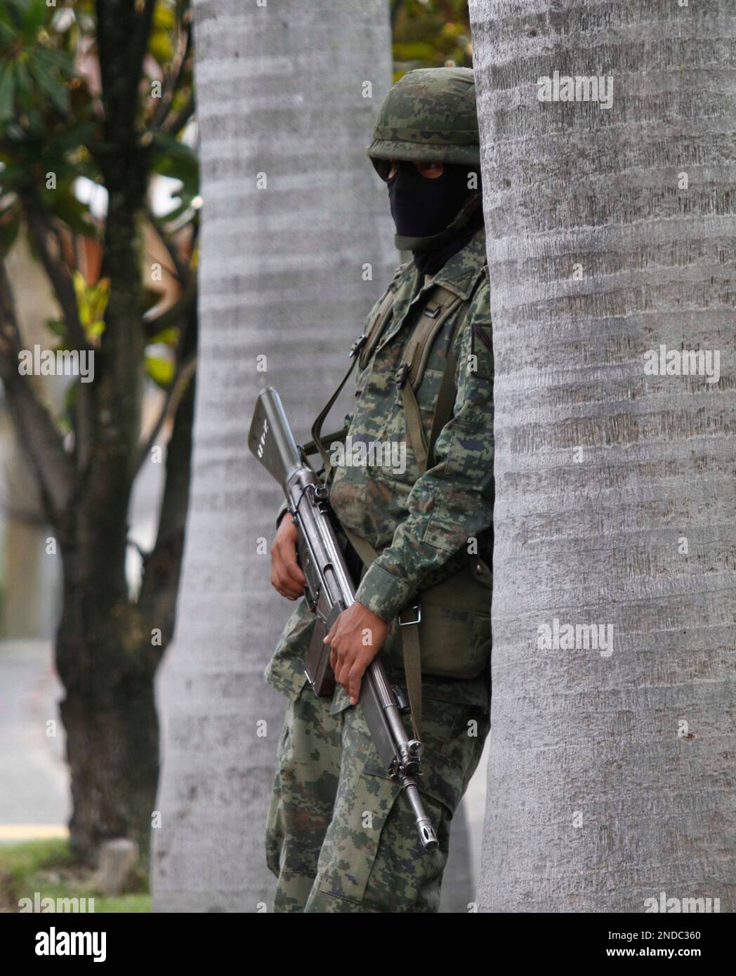 A soldier guards a street in the area where, according to Mexico's ...