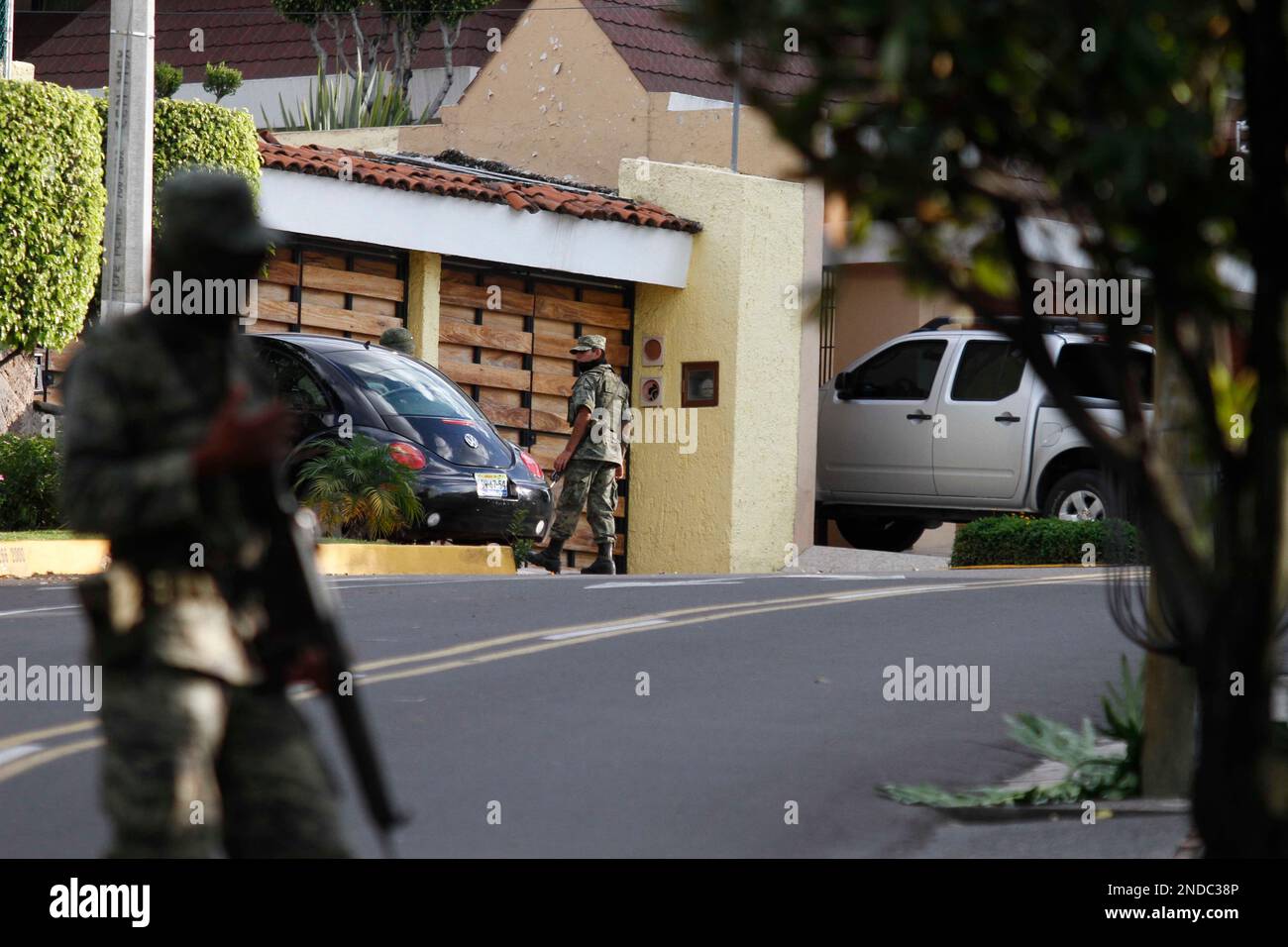 Soldiers guard a street in the area where, according to Mexico's ...