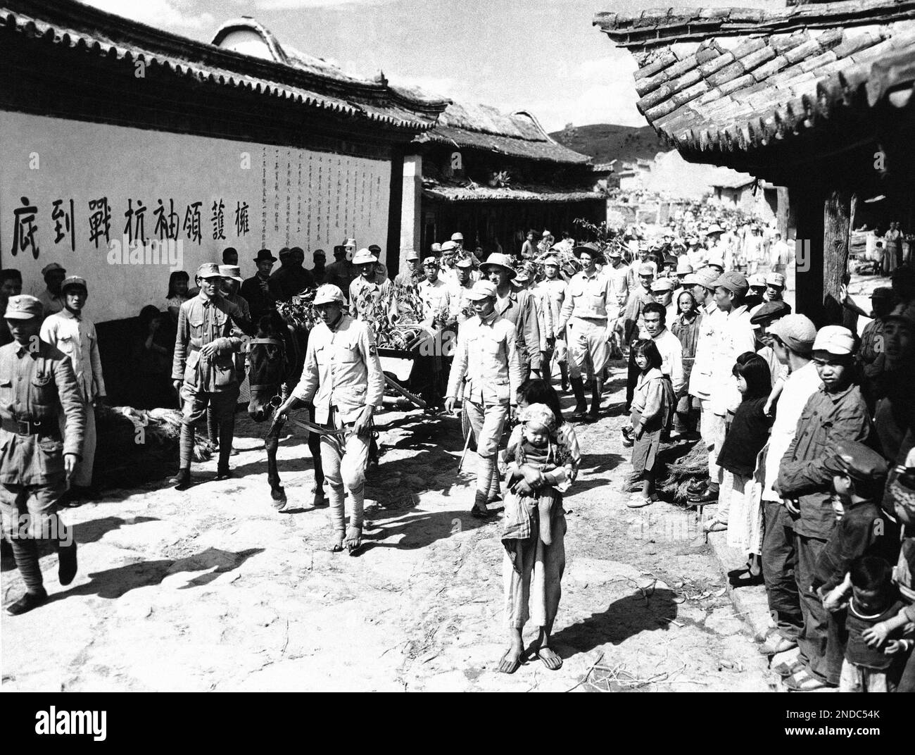 A mountain pack artillery battery, composed of Chinese soldiers trained ...
