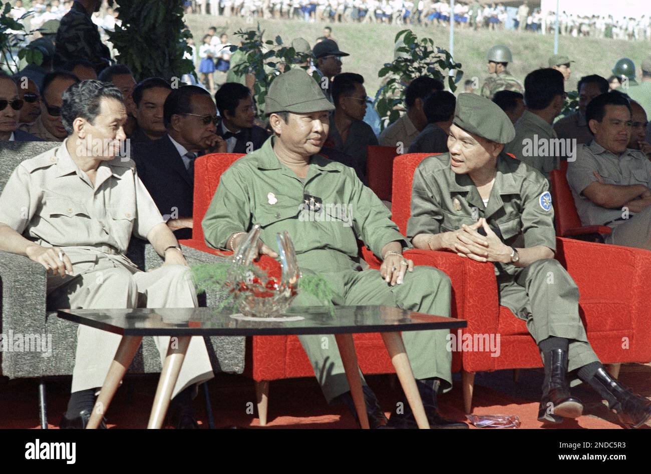 Sitting looking away authority leadership communication hands clasped ...