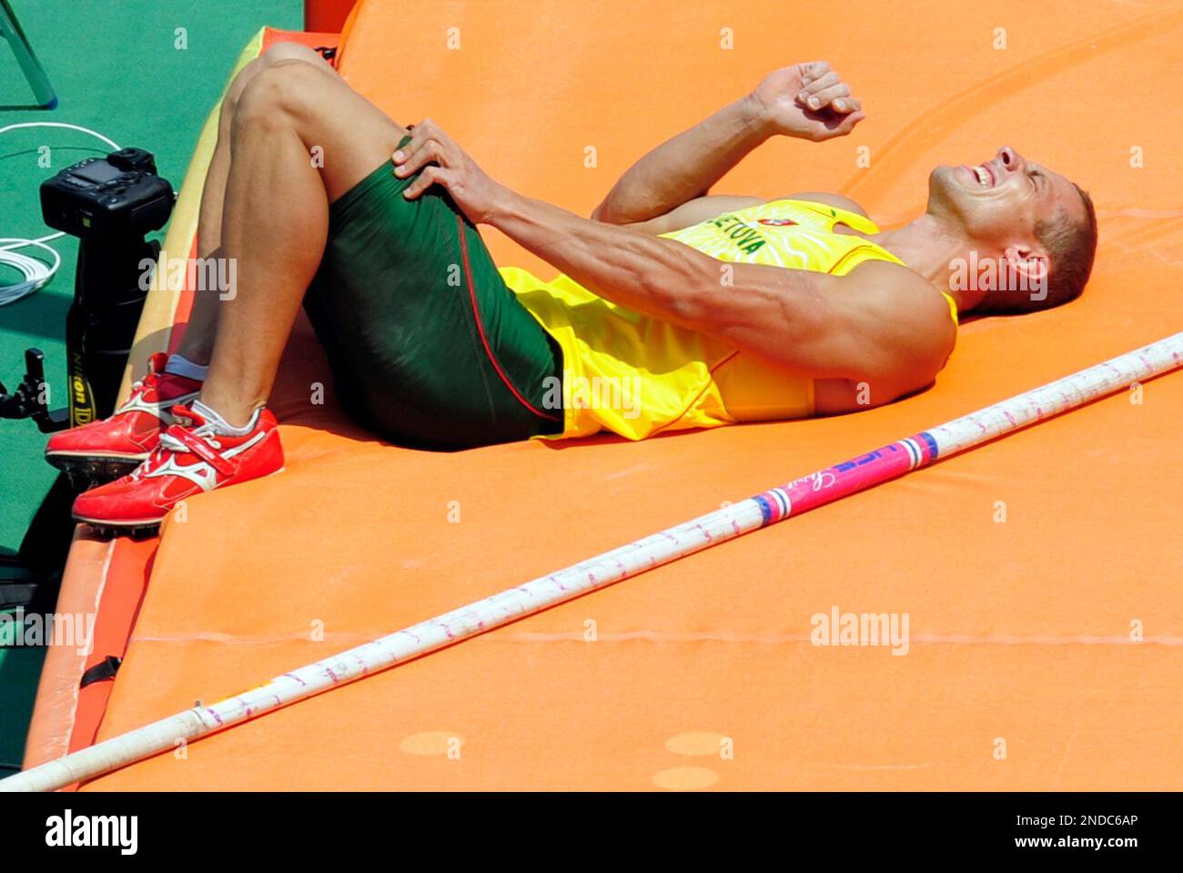 Lithuania's Darius Draudvila reacts as he competes in the Men's Pole ...
