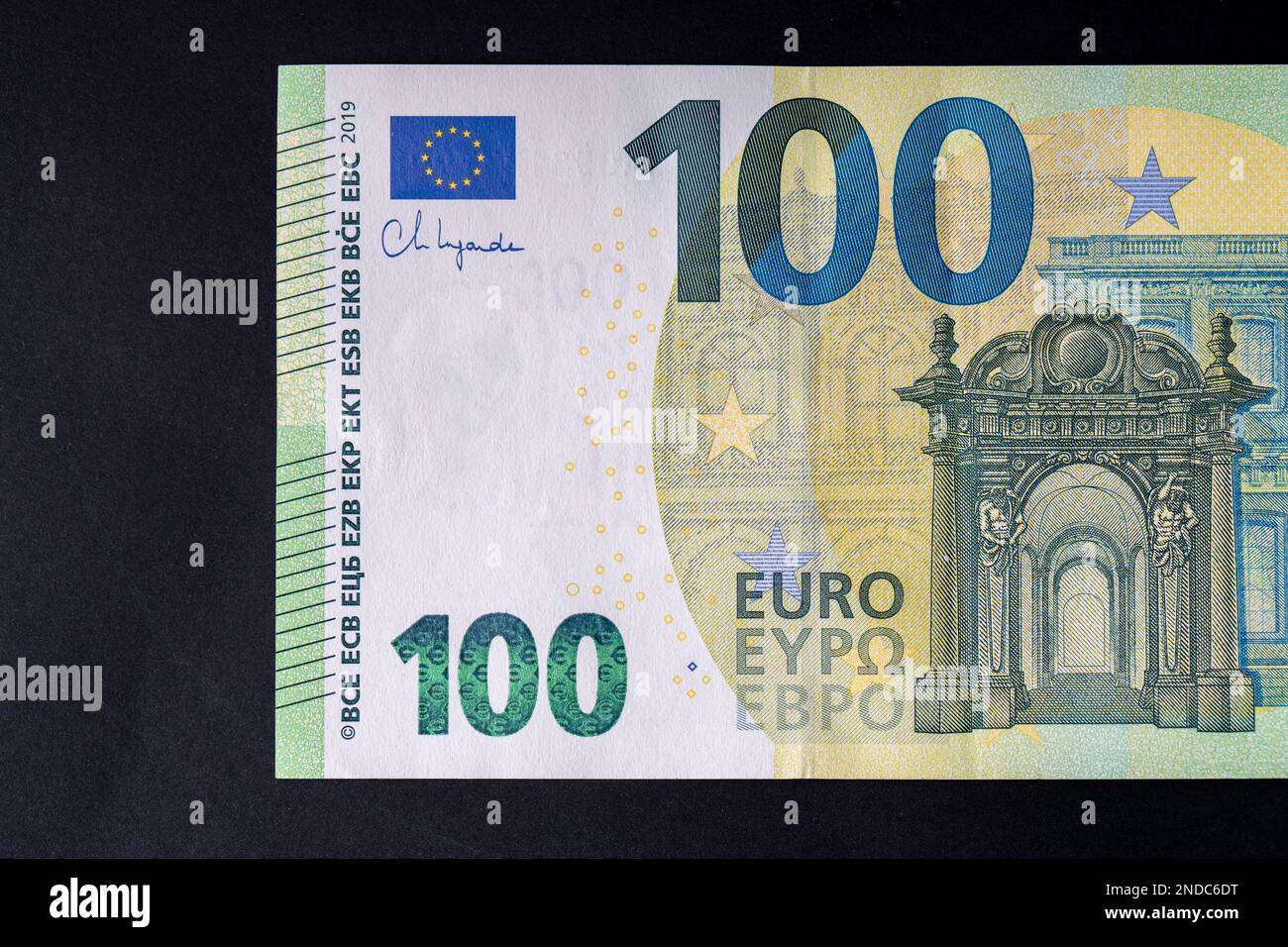 100 euro banknote close up on black background for business finance ...