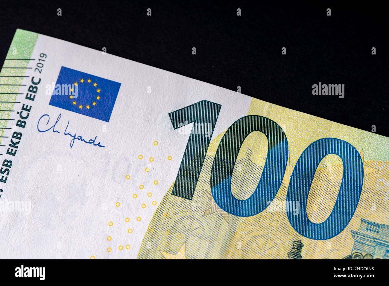 100 euro banknote close up on black background for business finance ...