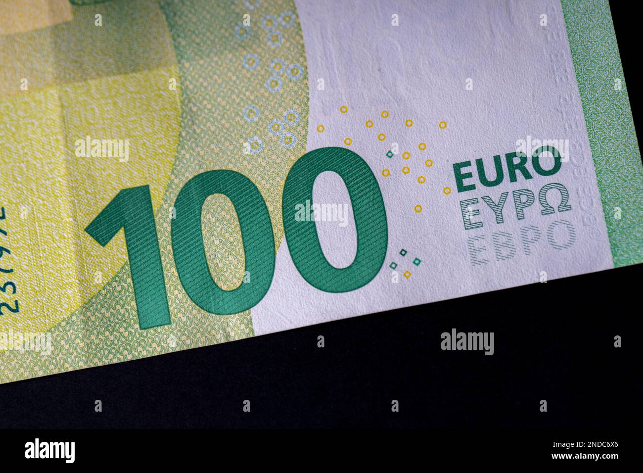 100 euro banknote close up on black background for business finance ...