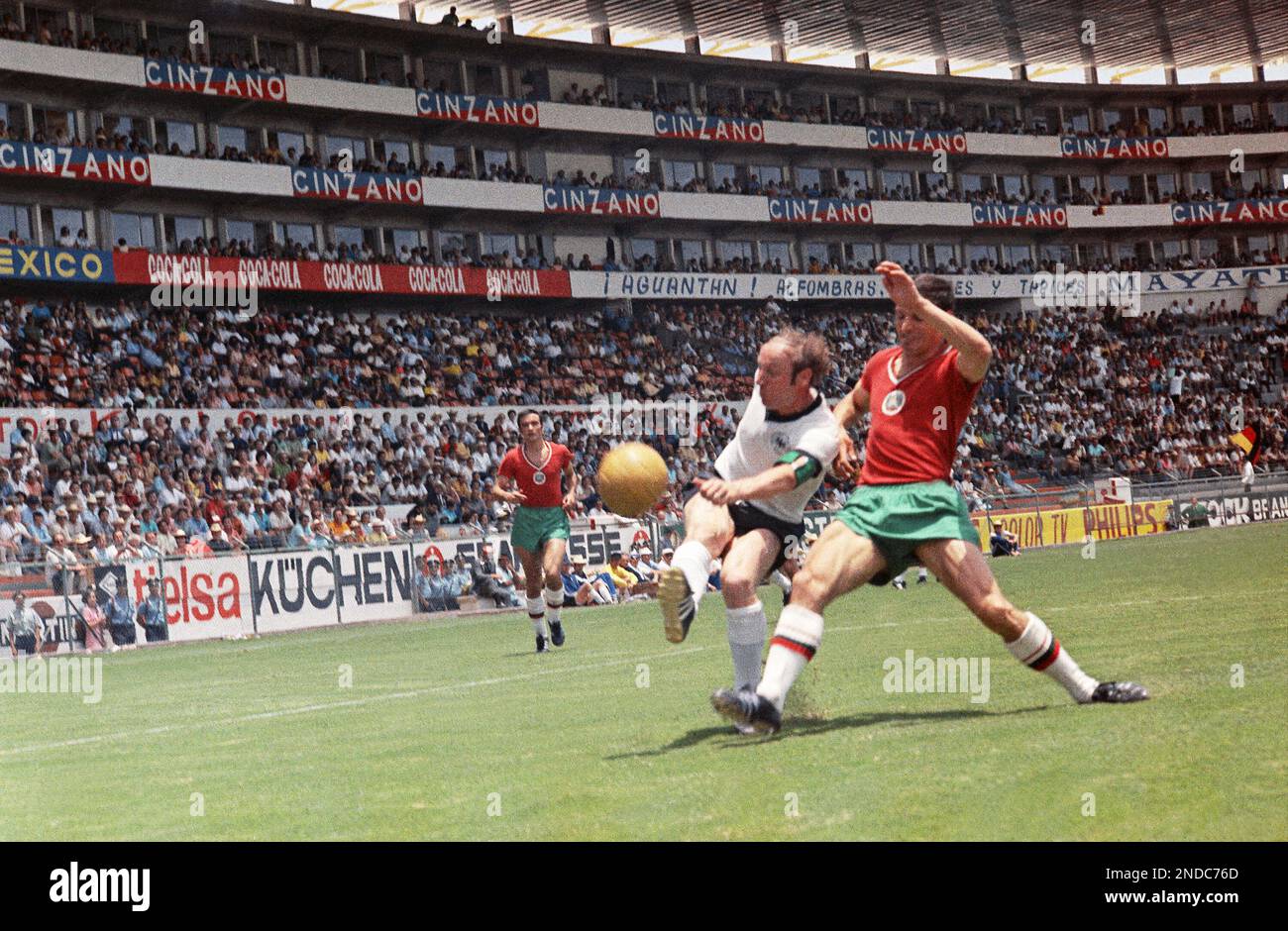 German center-forward Uwe Seeler shoots past an unknown Bulgarian ...