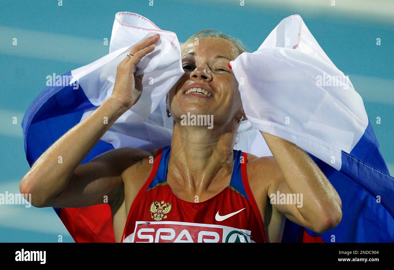 Russia's Inga Abitova celebrates after placing second in the Women's ...
