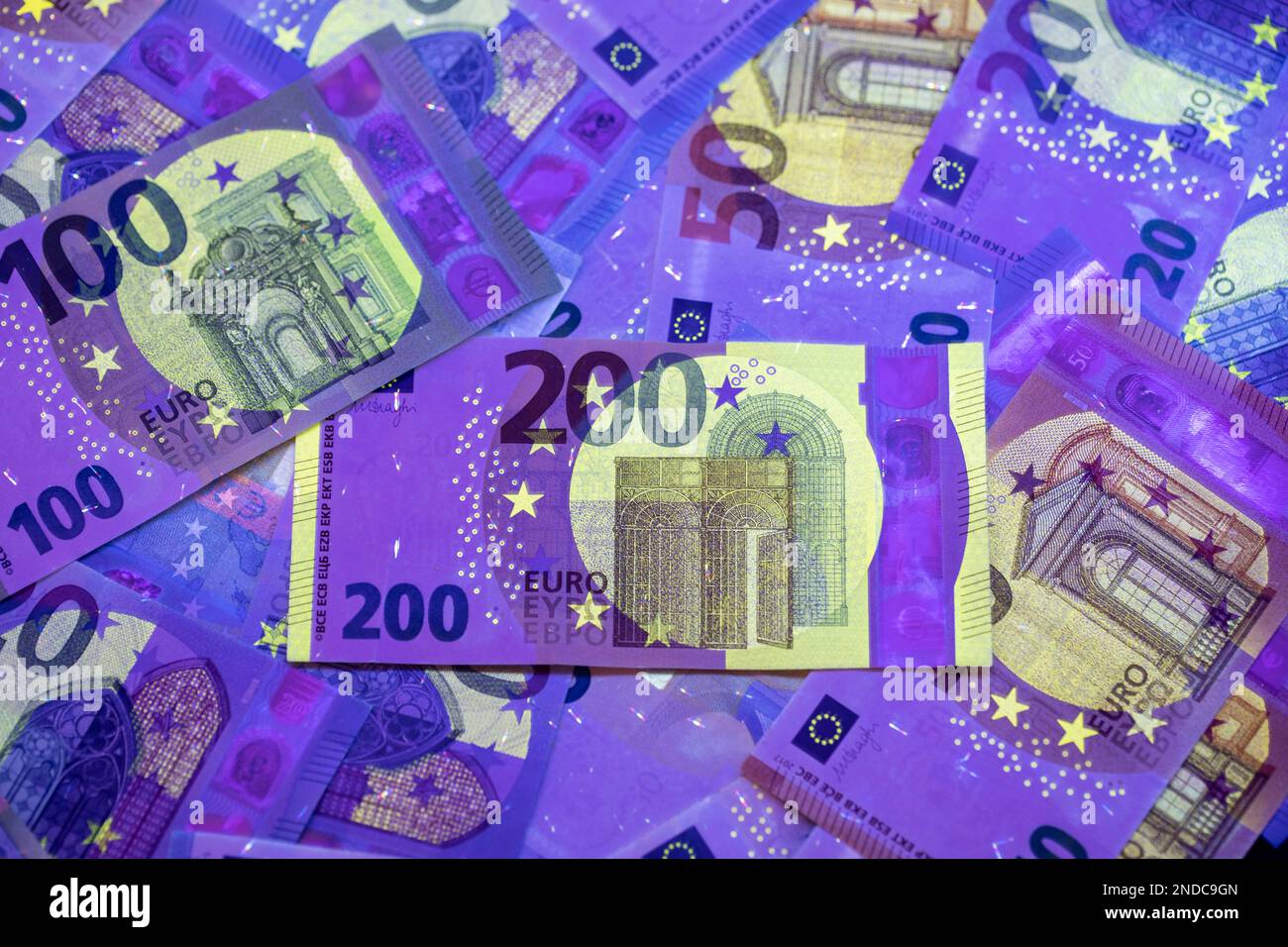 Euro currency in UV light protection. Euro in UV light to check the ...