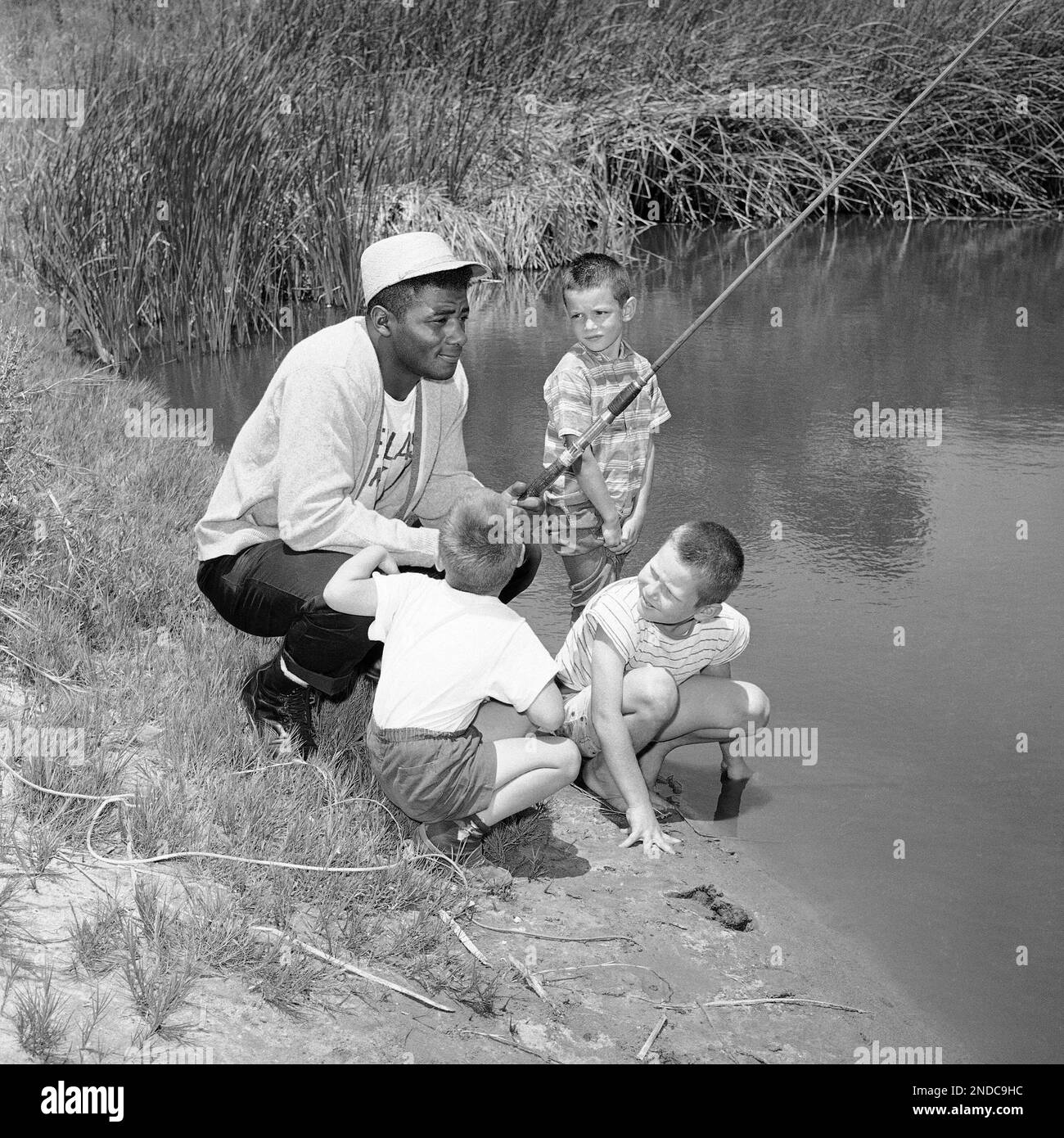 Heavyweight champion Floyd Patterson takes time out from his training ...