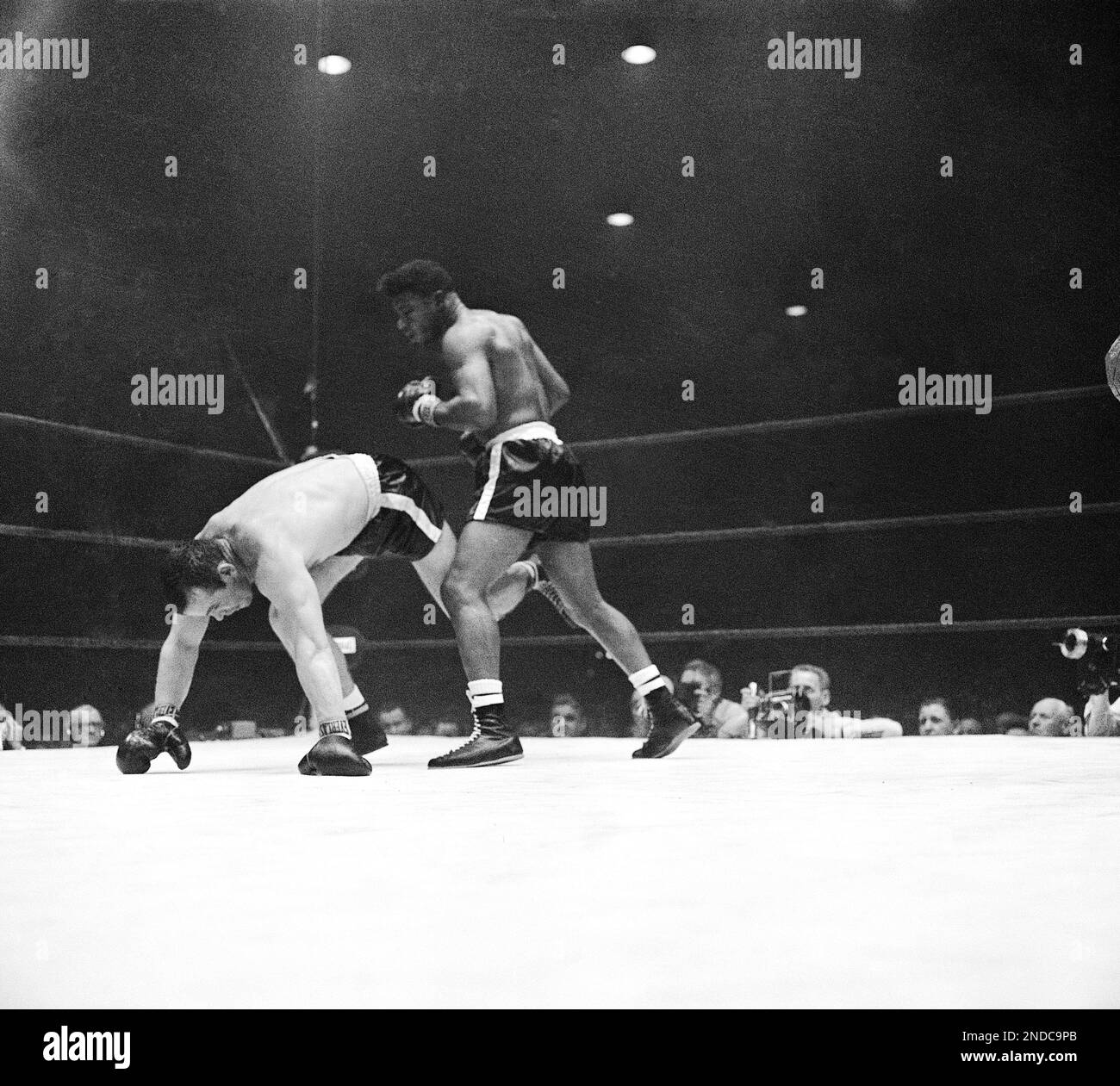 Heavyweight champion Floyd Patterson stands over challenger Ingemar ...