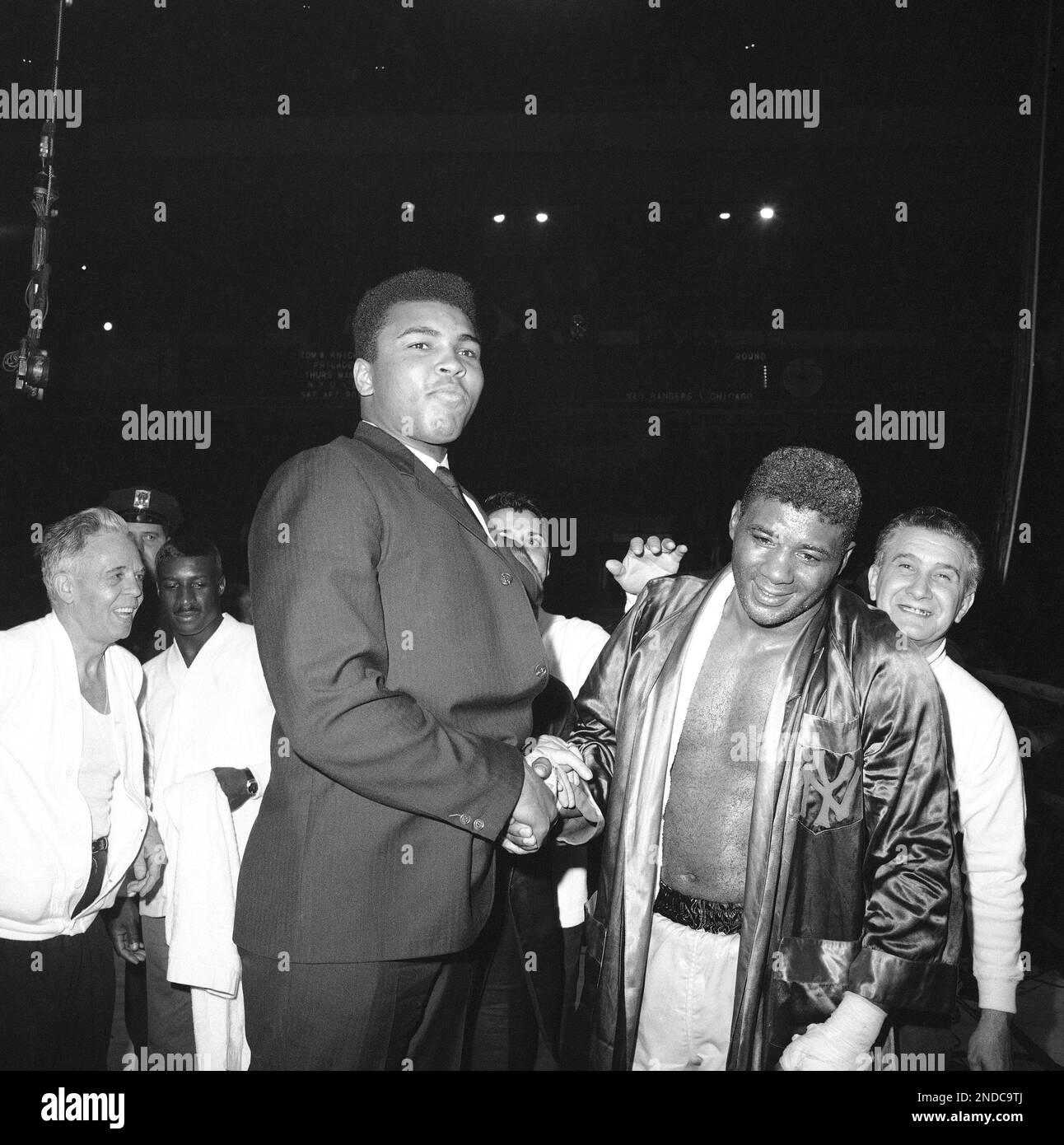 World heavyweight champion Cassius Clay congratulates Floyd Patterson ...
