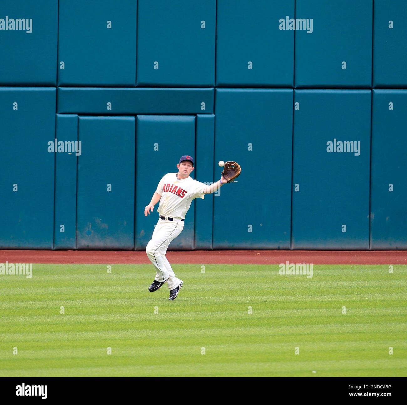 Cleveland Indians' Austin Kearns fields a ball in a baseball game ...