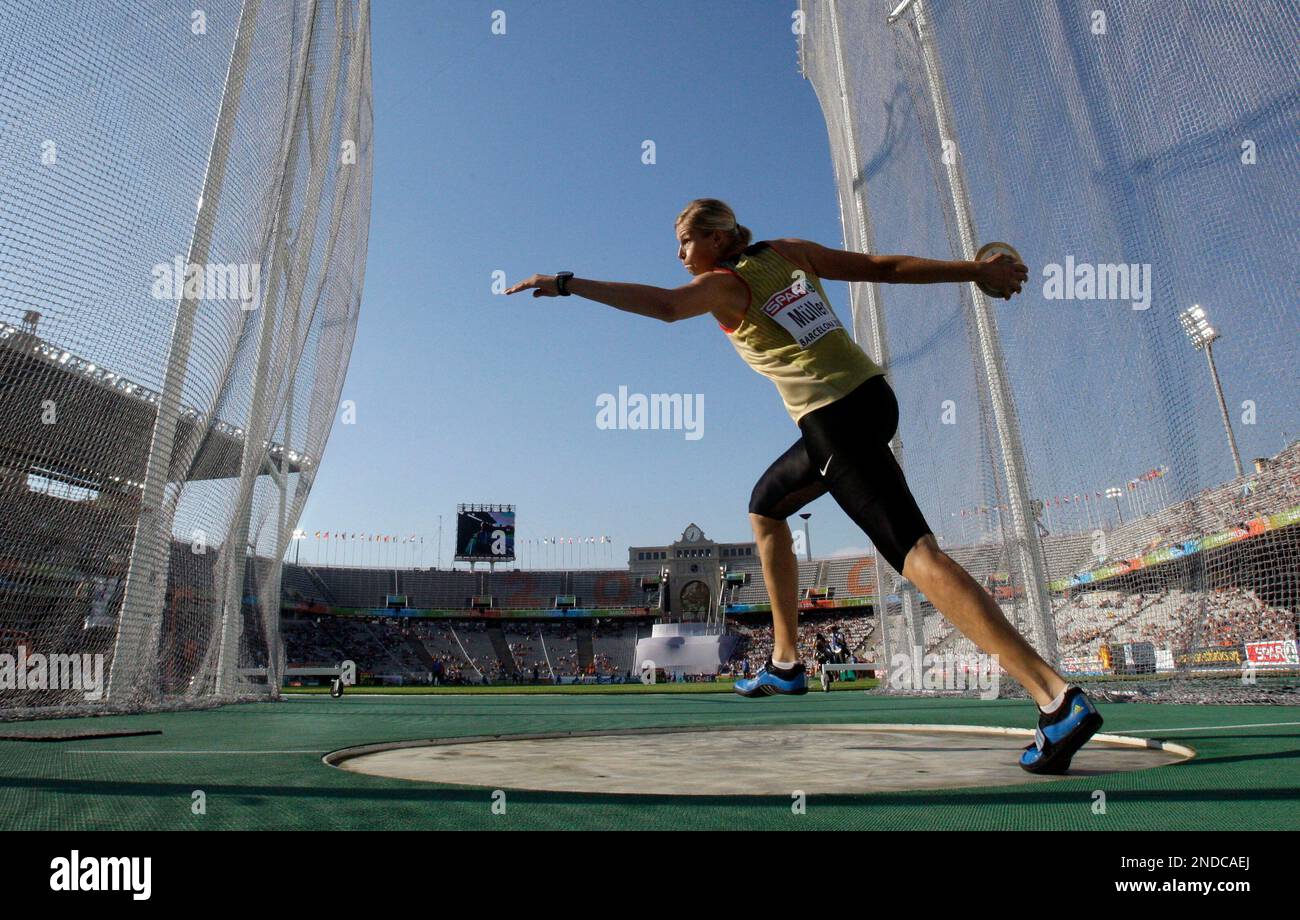 Germany's Nadine Muller competes in the Women's Discus final during the ...