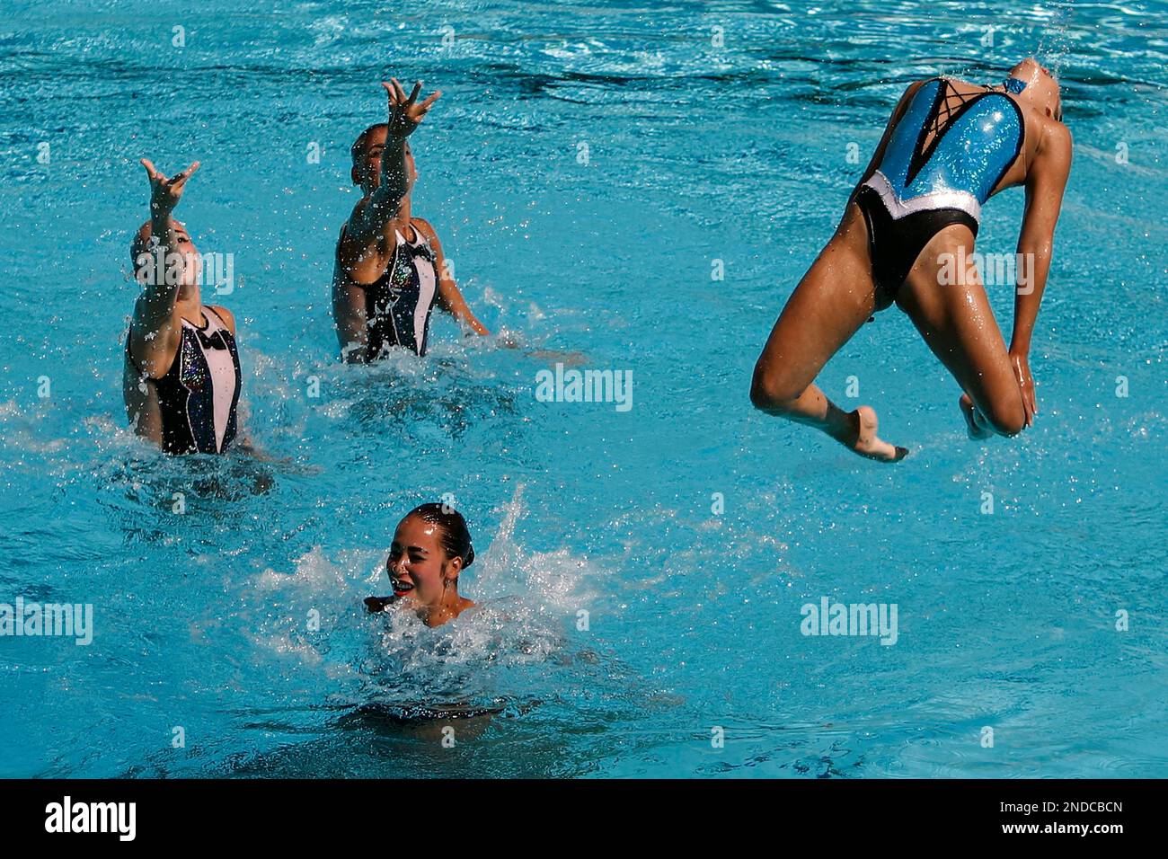 Mexico's synchronized swimming team performs in the combination finals ...