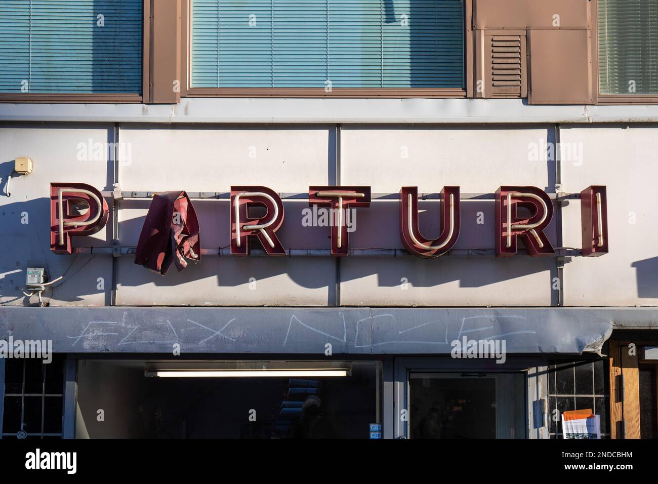 Parturi neon lights with broken A on Fleminginkatu in Harju district of ...