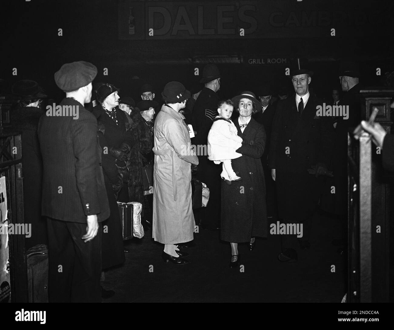 Interested spectators watching Britain's Princess Alexandra being ...