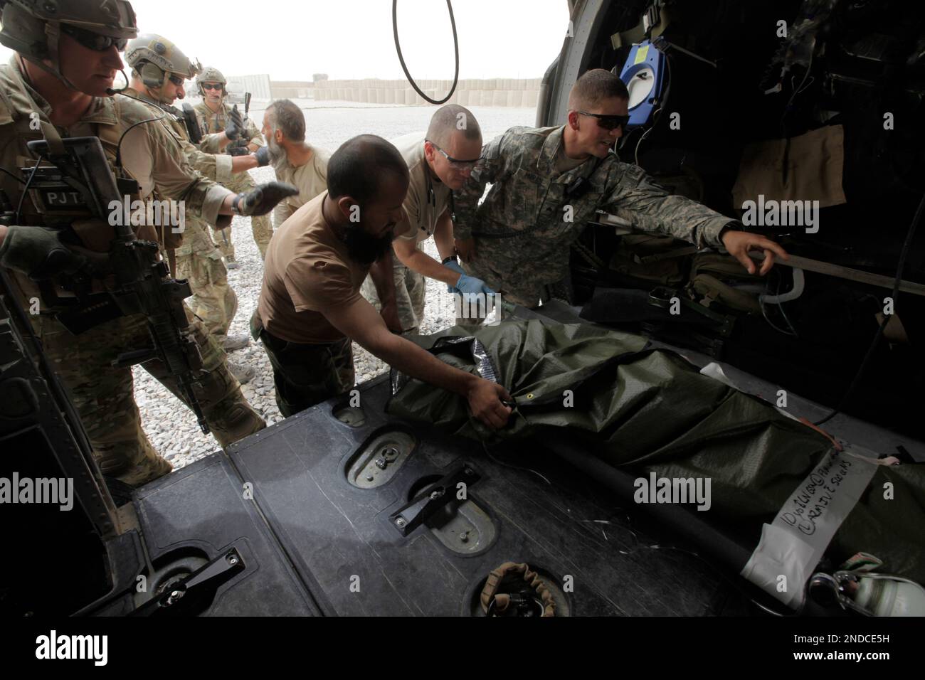 Team leader and Tech. Sgt. Jeff Hedglin, a Pararescueman, or "PJ," of ...