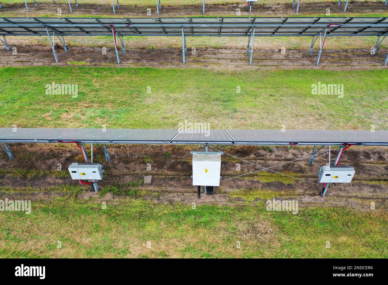 Rear view of renewable solar power plant. Aerial view of converting ...