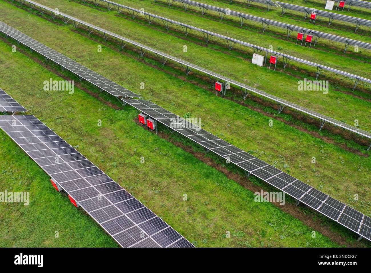 Rear view of renewable solar power plant. Aerial view of converting ...